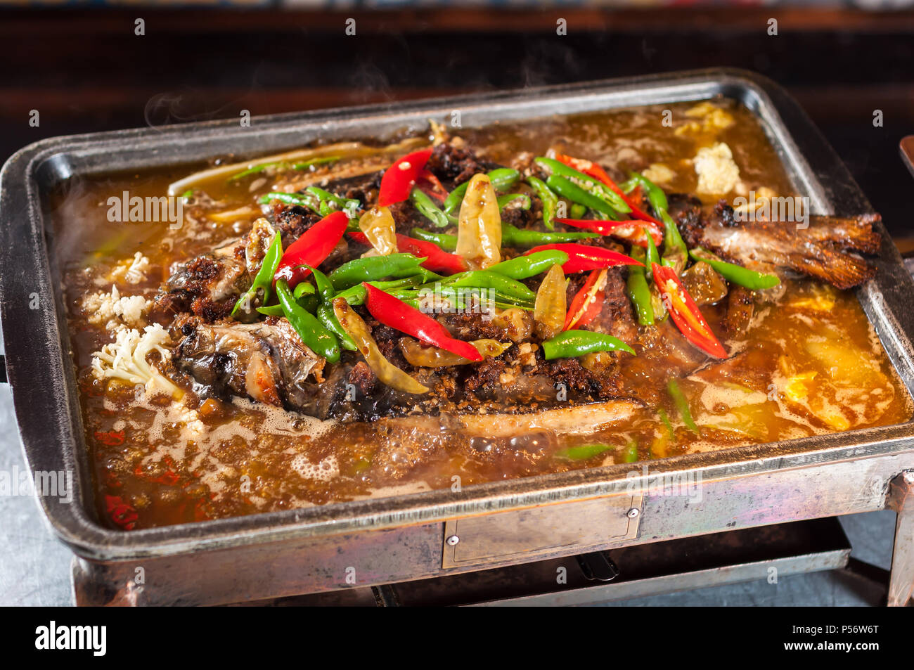 Chinese popular grilled fish Stock Photo - Alamy