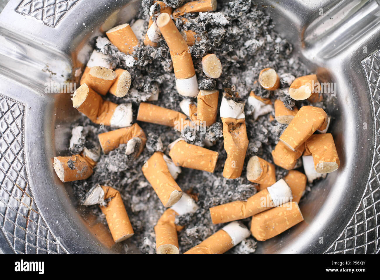 an image of cigarette buts Stock Photo - Alamy