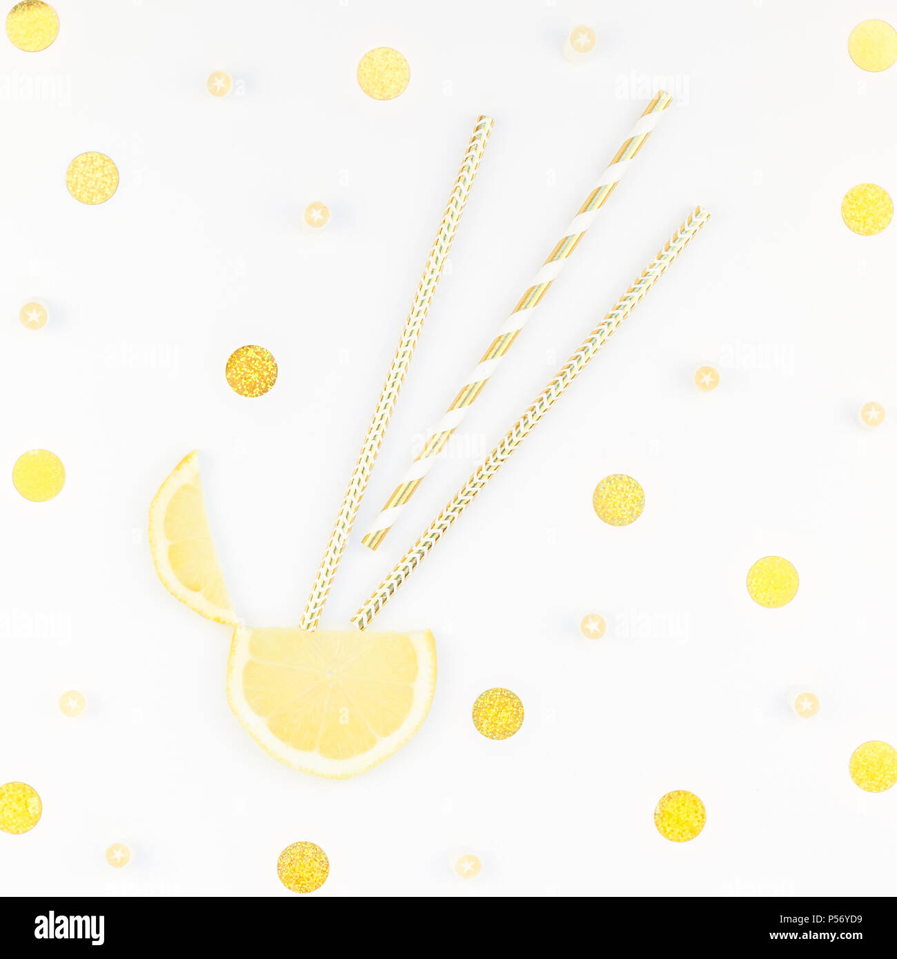 Square flatlay overhead top view citrus lemon slices and candies white ...