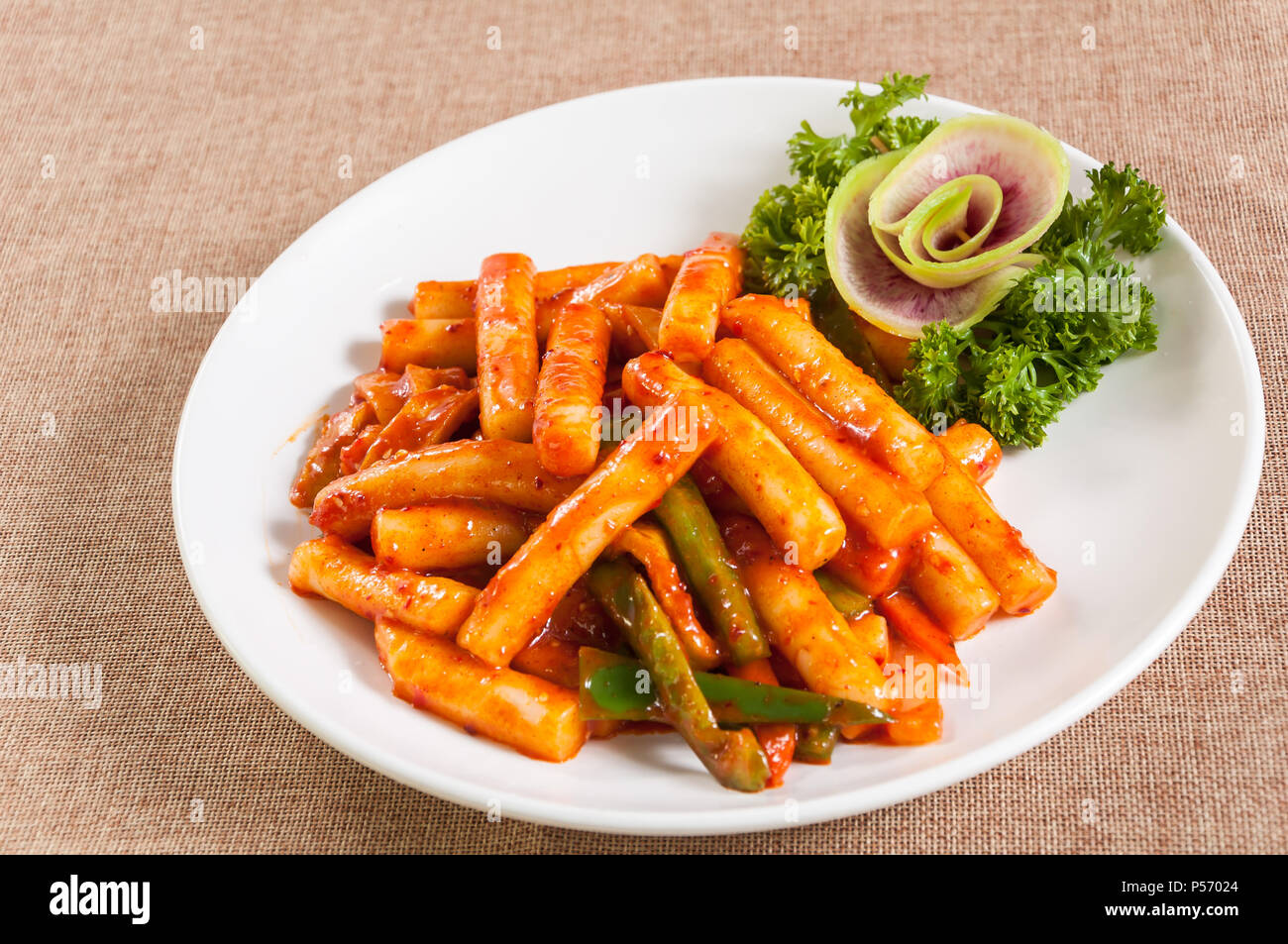 Spicy fried rice cake Stock Photo - Alamy