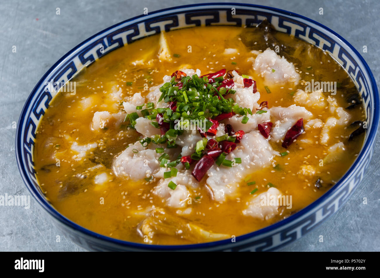 Boiled Fish with Pickled Cabbage and Chili Stock Photo - Alamy
