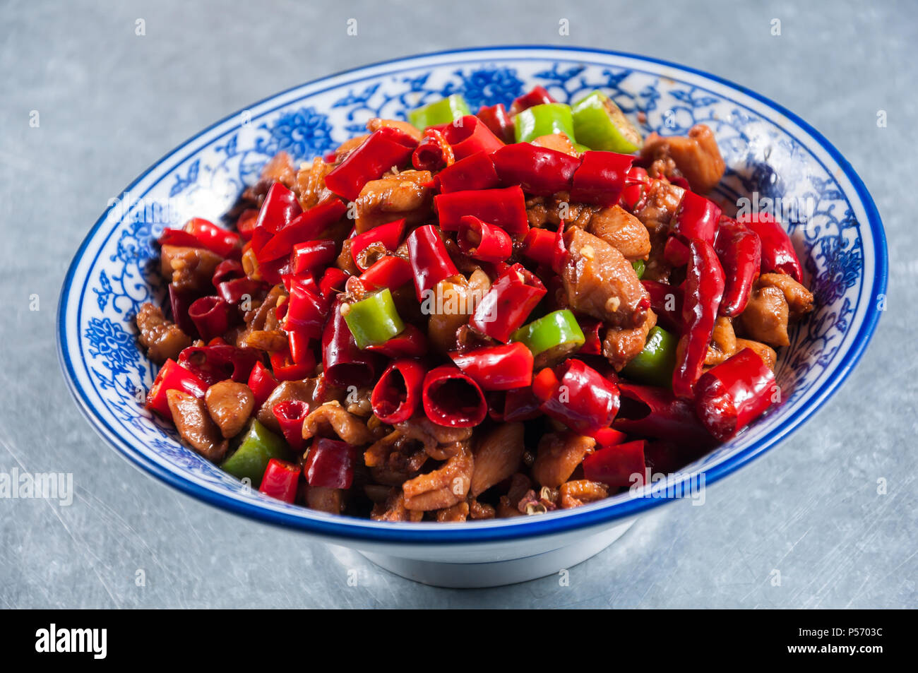 Sautéed Diced Chicken with Chili Pepper Stock Photo - Alamy