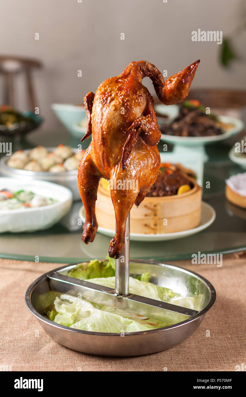 Cooked chicken hanging hi-res stock photography and images - Alamy