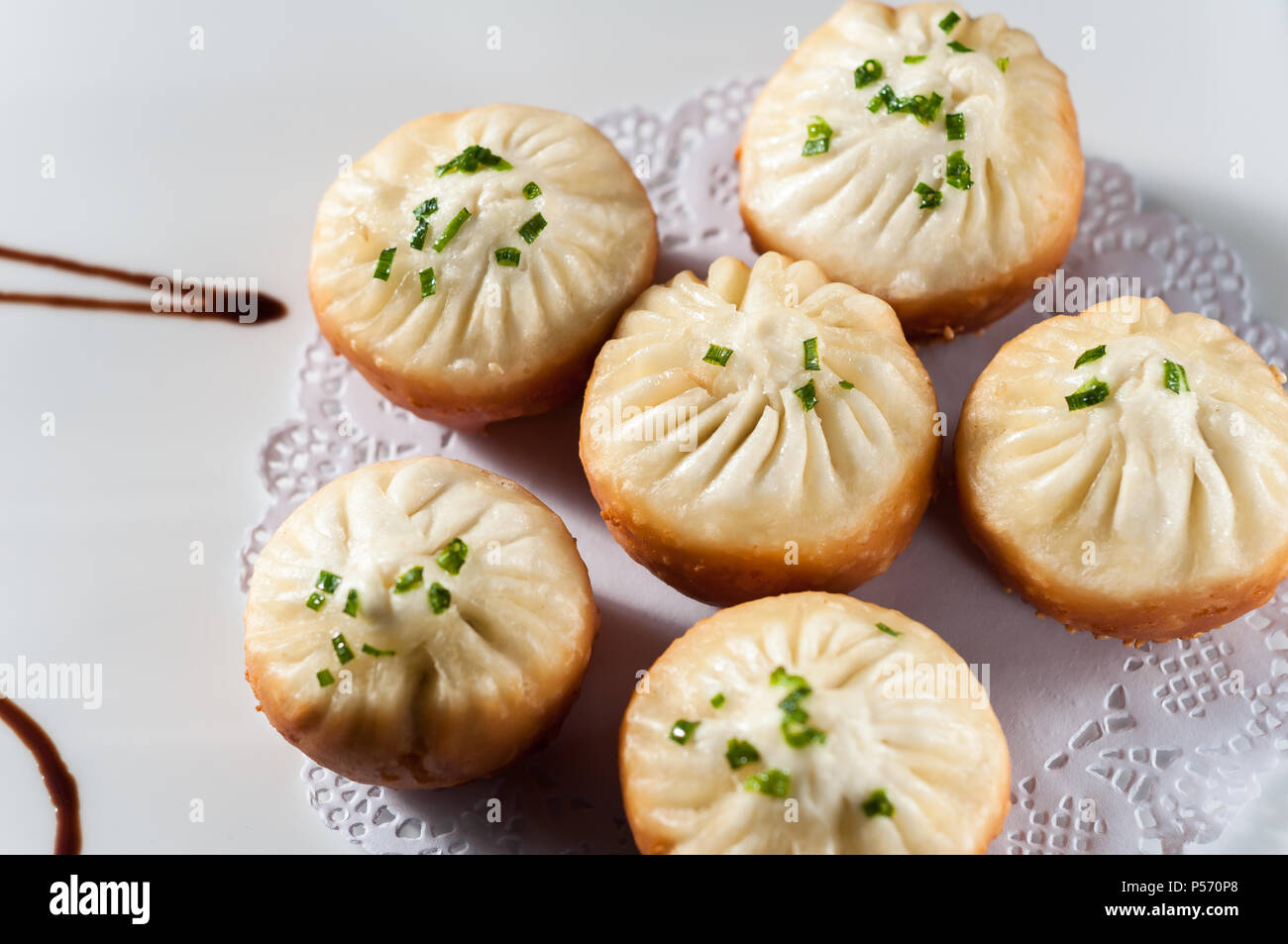 Pan-Fried Baozi Stuffed with Pork Stock Photo - Alamy