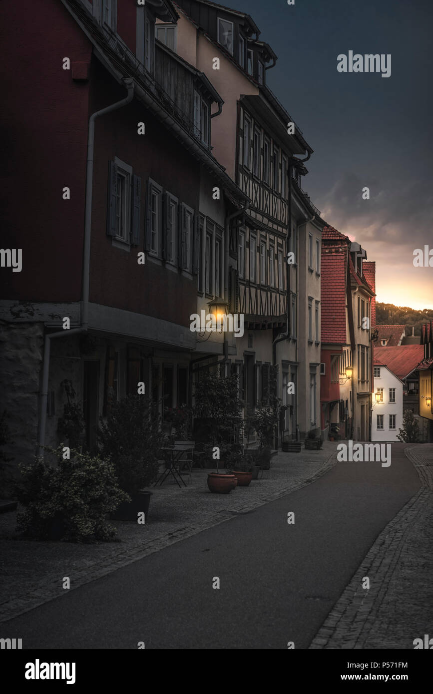 Narrow street alley from a small town, Schwabisch Hall, with old houses ...