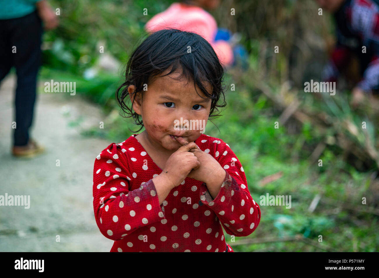 Ha Giang, Vietnam - March 18, 2018: Child pertaining to the Mong ethnic ...