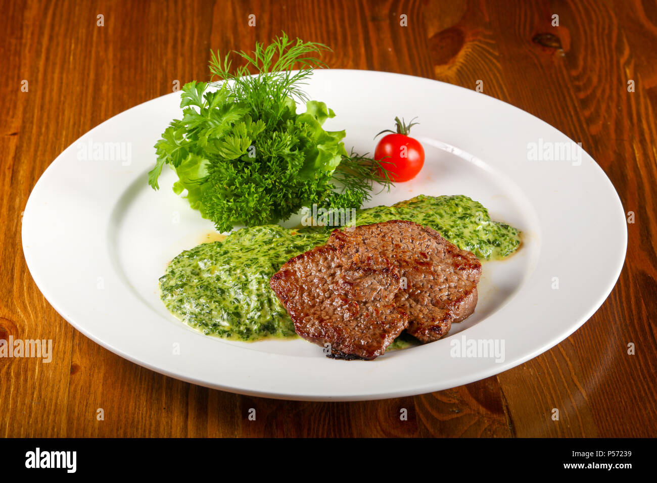 Beef with spinach mousse Stock Photo - Alamy