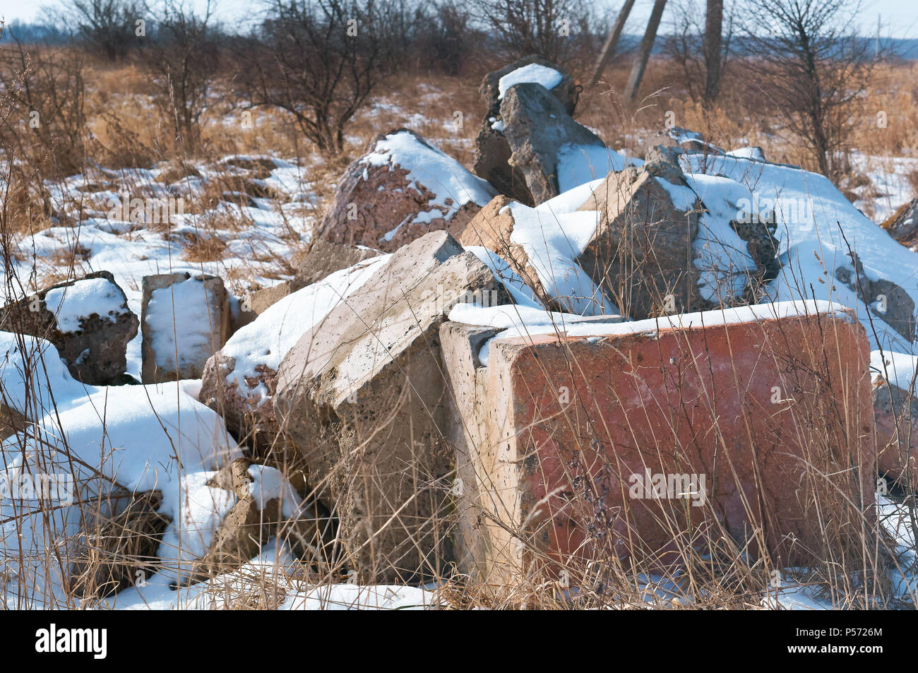 the wreckage of concrete slabs in nature, construction waste in the ...