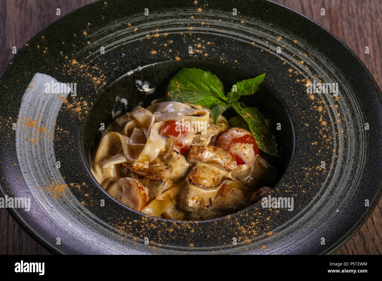 Delicous pasta with mushroom served basil Stock Photo - Alamy