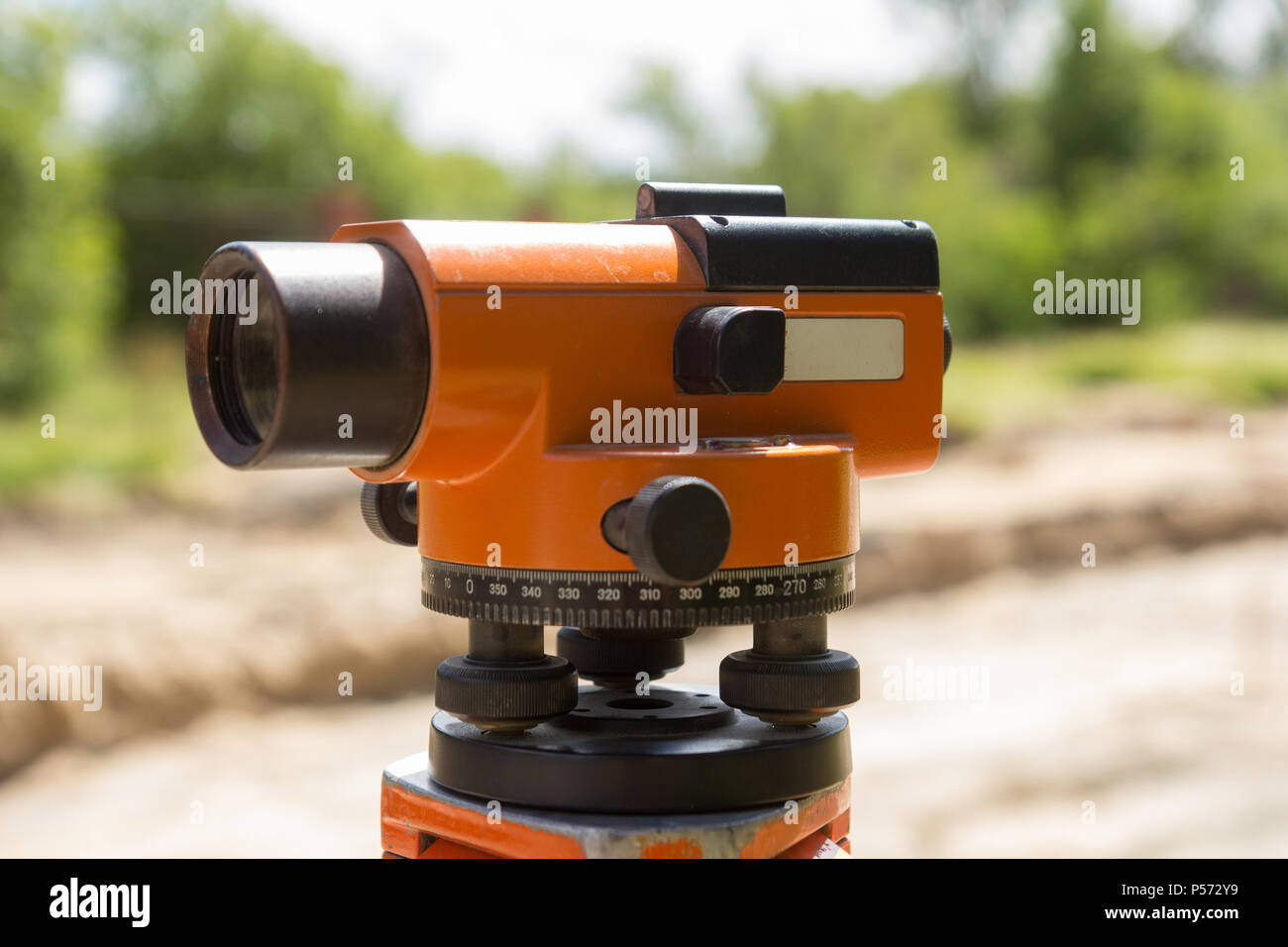 a construction surveyor equipment theodolite level tool Stock Photo - Alamy