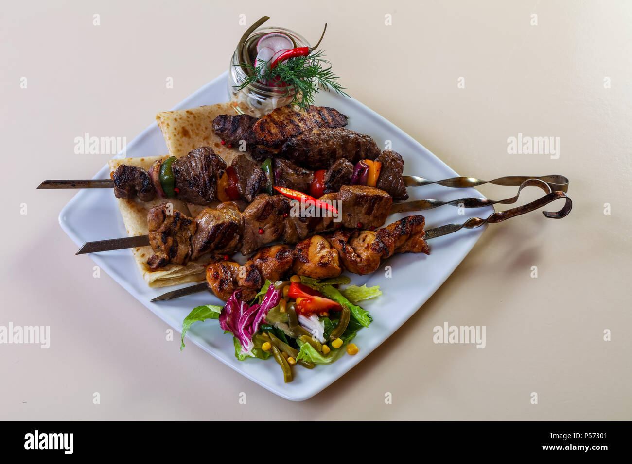 Barbeque meat mix plate with vegetalbes Stock Photo - Alamy