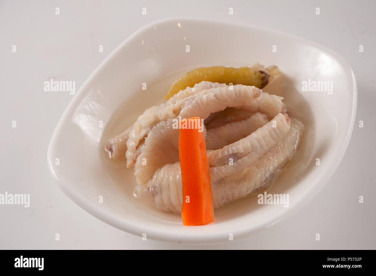 Chicken Feet with Pickled Peppers Stock Photo - Alamy