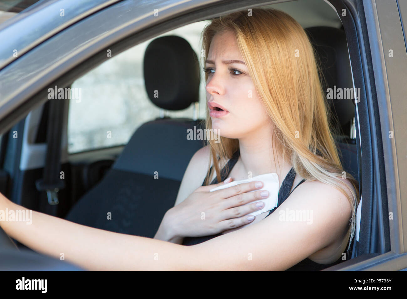 woman tired of heat in summer Stock Photo - Alamy