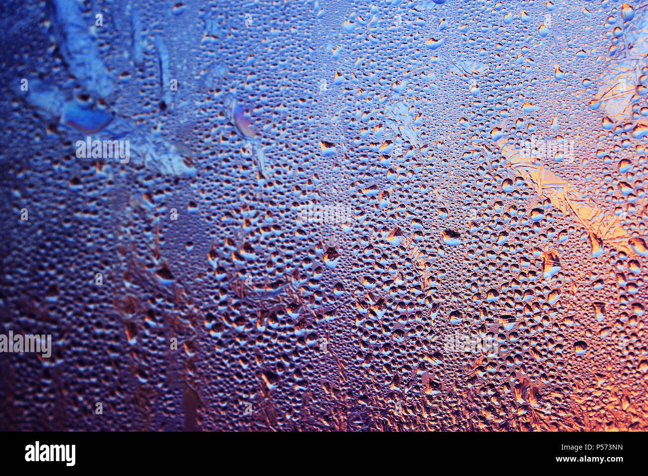 Colourful Pattern, Light Shining Through Condensation on Glass Window ...