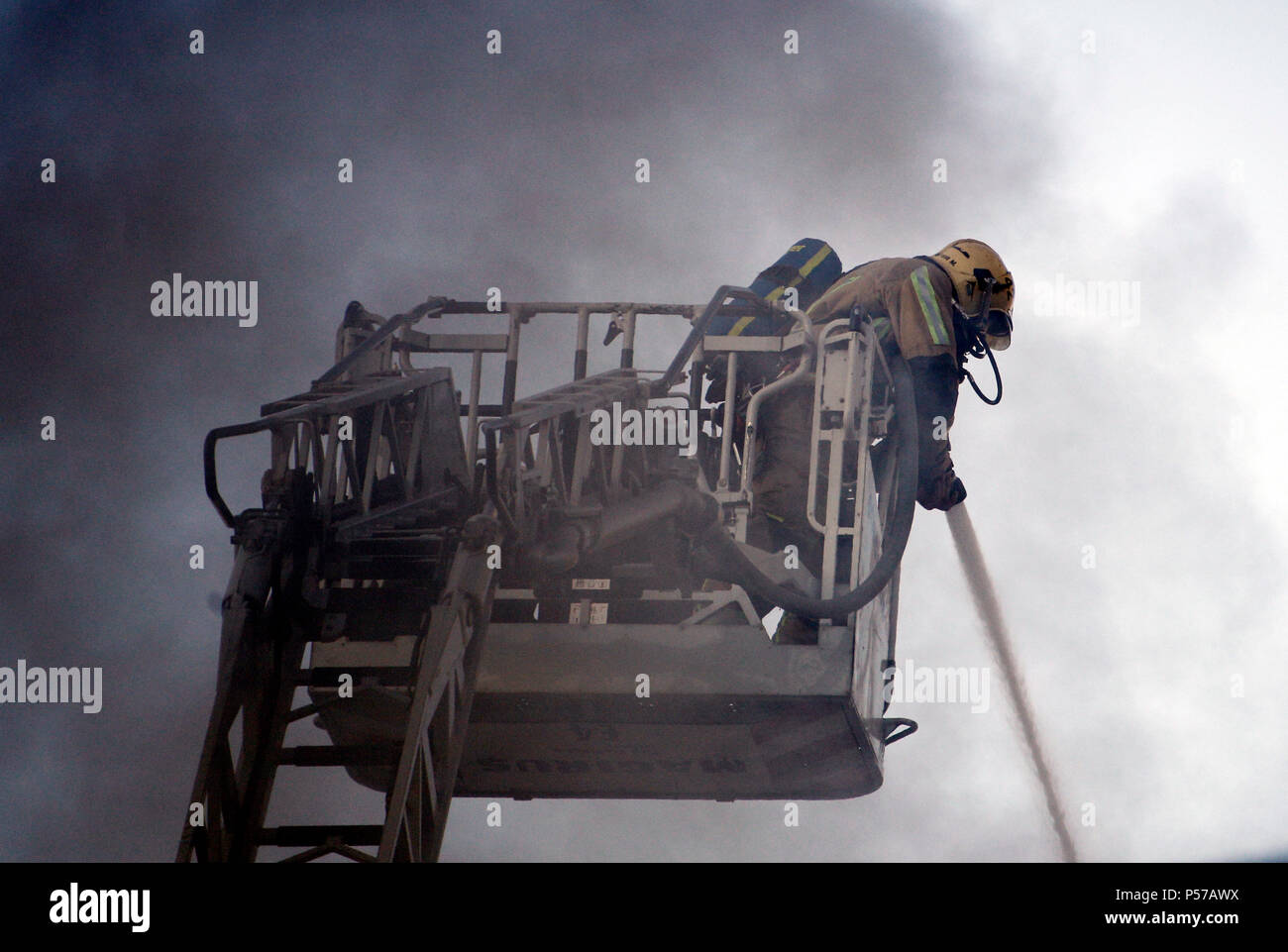 Brussels, Belgium. June 25th, 2018. Firefighters try to extinguish a ...