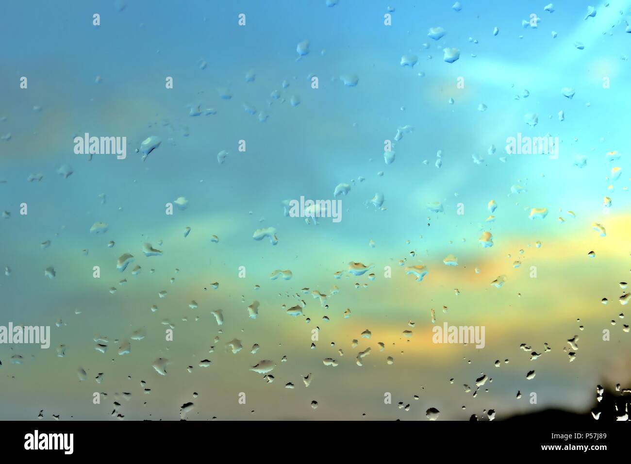 Raindrops on a windowpane Stock Photo - Alamy