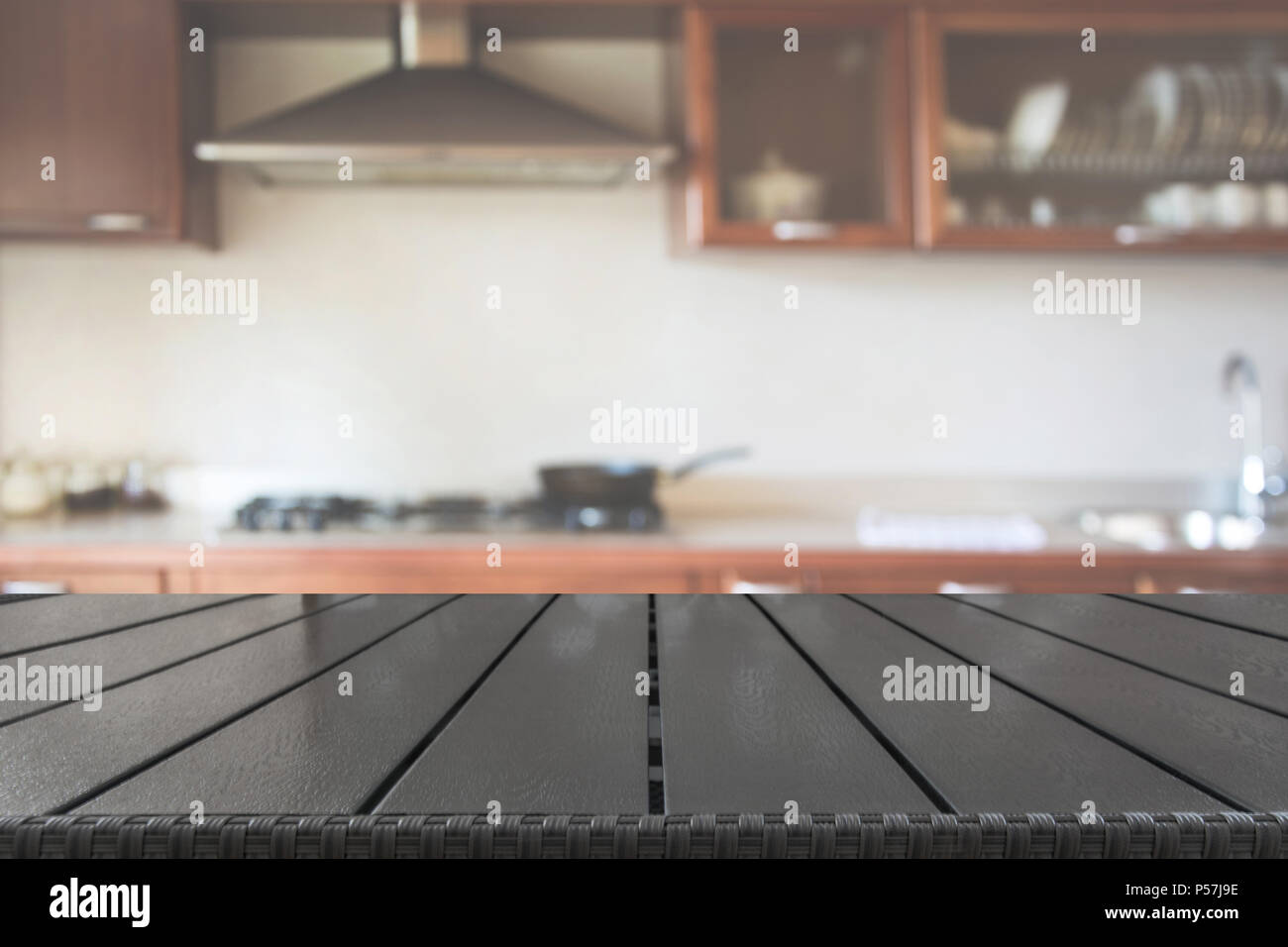 Blurred background. Modern kitchen with tabletop and space for you ...