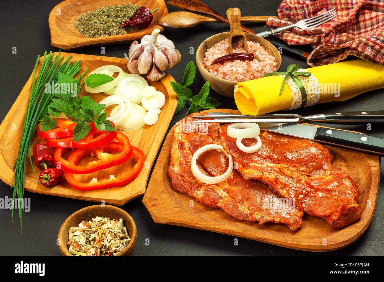 Raw marinated pork neck. Preparation of meat for grilling. Raw pork ...