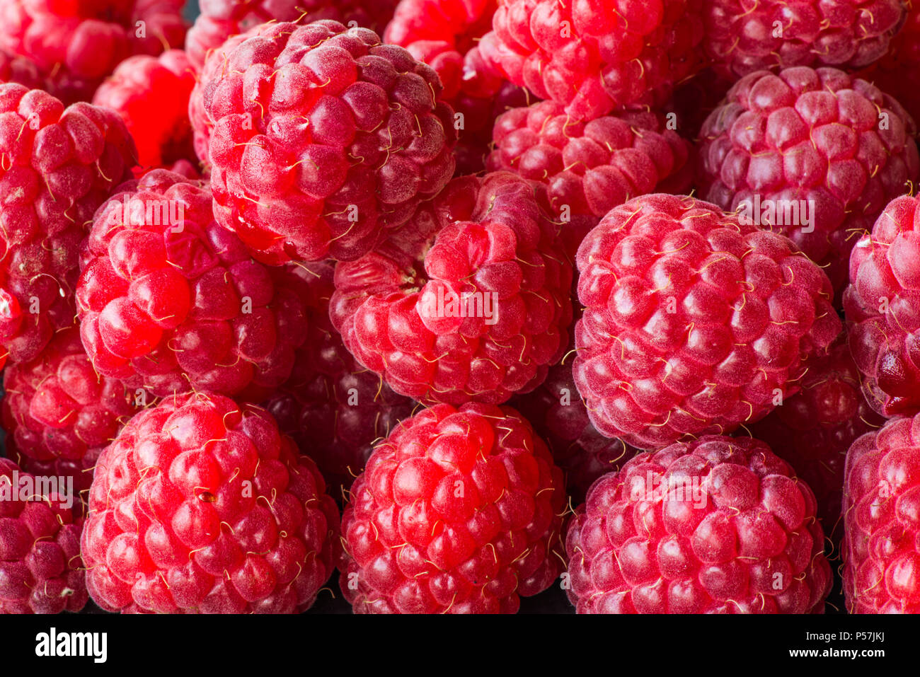 Raspberry fruit background. Macro Stock Photo - Alamy