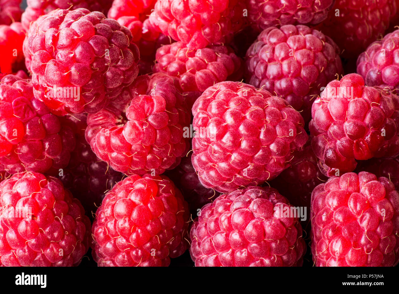 Raspberry fruit background. Macro Stock Photo - Alamy
