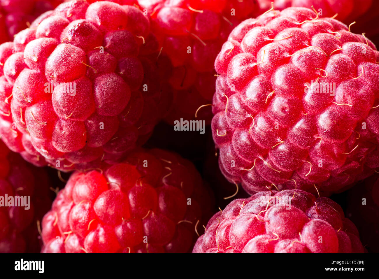 Raspberry fruit background. Macro Stock Photo - Alamy