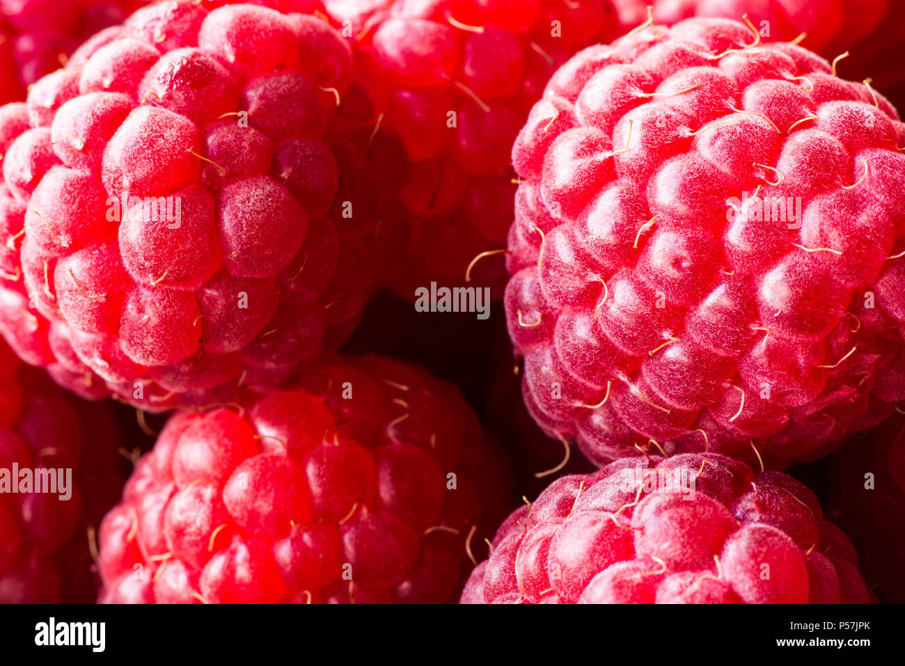 Raspberry fruit background. Macro Stock Photo - Alamy
