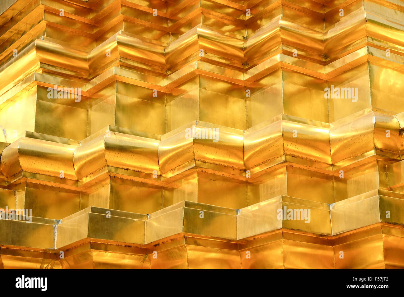 The gold stucco design of native thai style on the Wall Stock Photo - Alamy