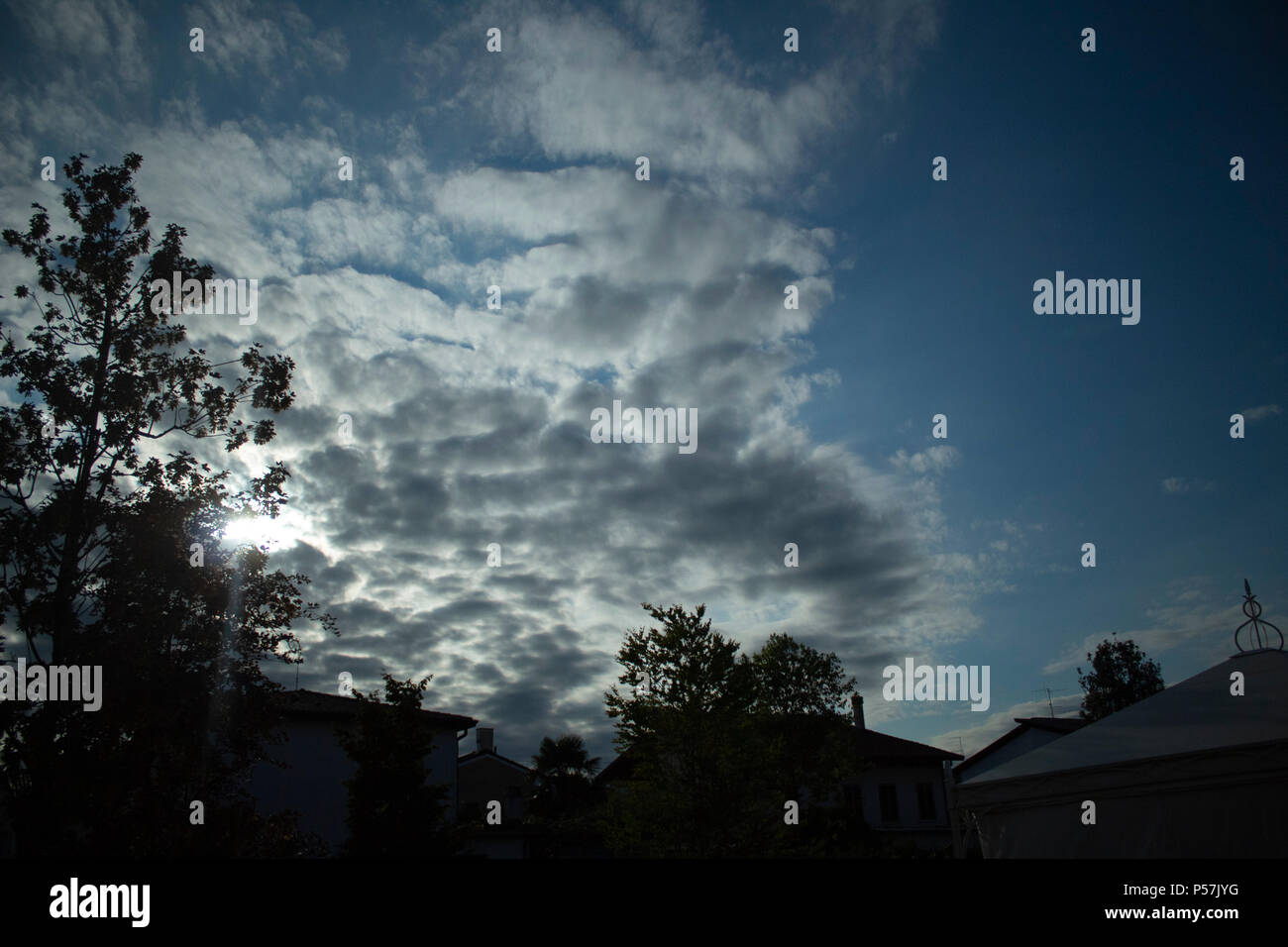 Reflection of the ray light through the clouds Stock Photo - Alamy