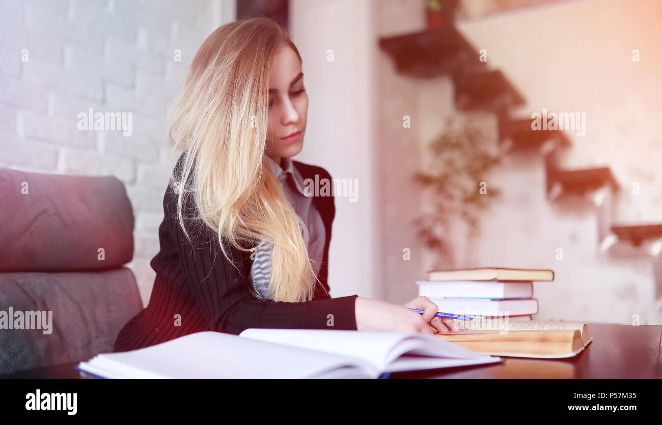 Young pretty blonde girl student before class Stock Photo - Alamy