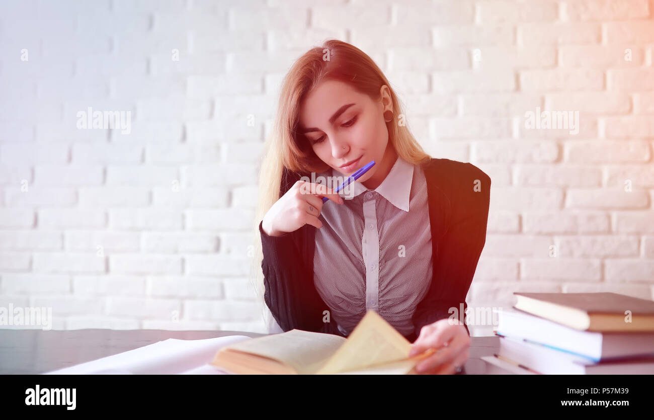 Young pretty blonde girl student before class Stock Photo - Alamy