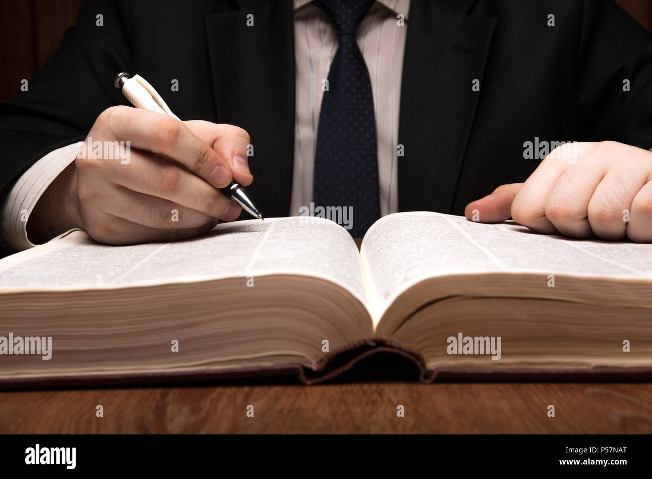 Looking at the dictionary hi-res stock photography and images - Alamy