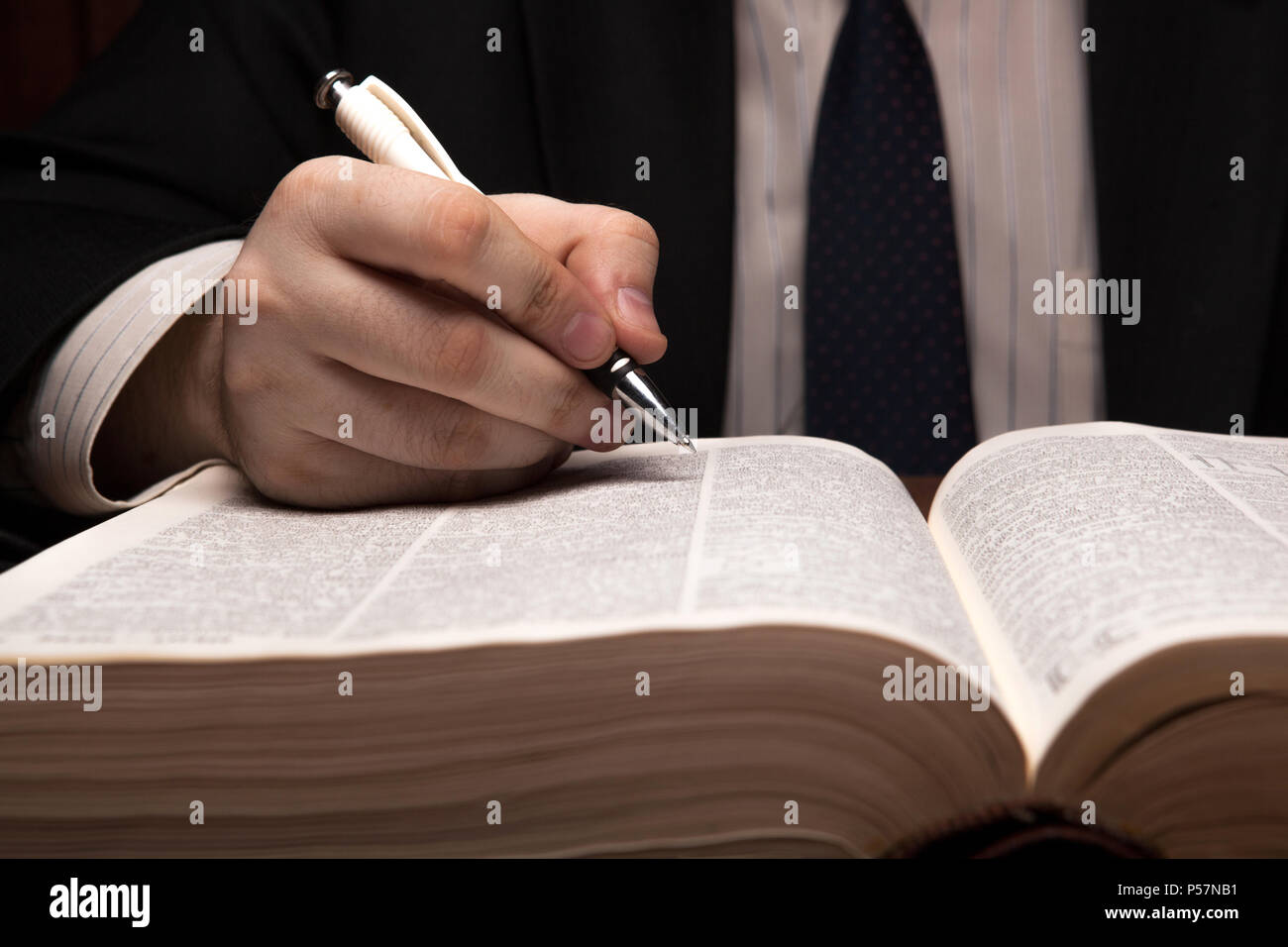 Dictionary man searching hi-res stock photography and images - Alamy