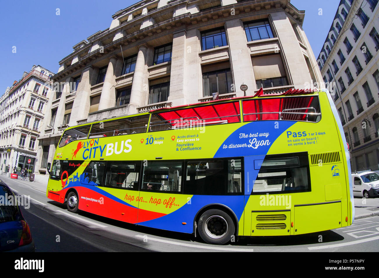 Hop on Hop off tourism bus, Lyon, France Stock Photo - Alamy