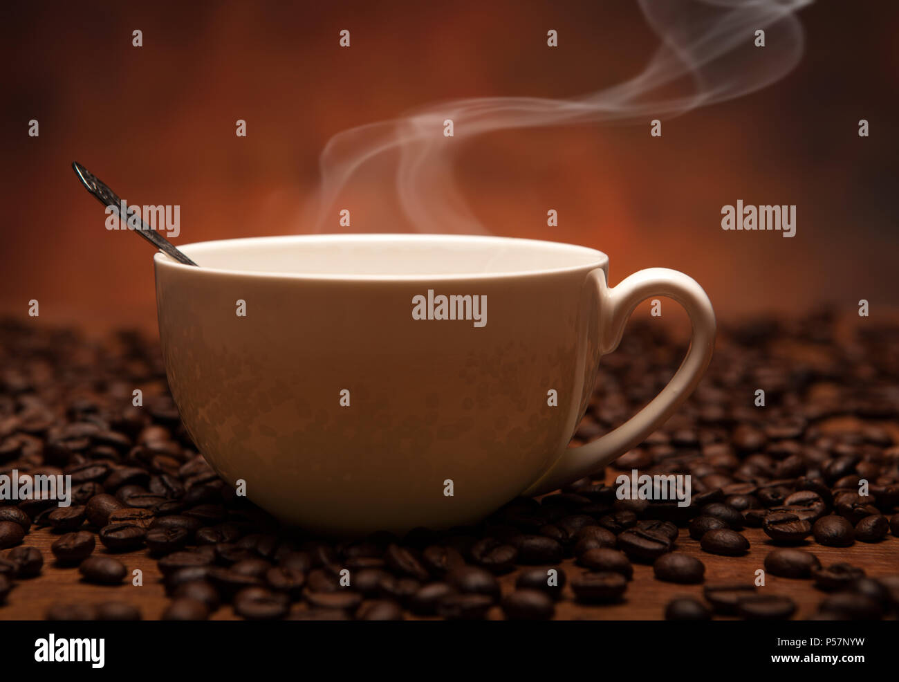 cup of coffee with with smoke on a coffee background Stock Photo - Alamy