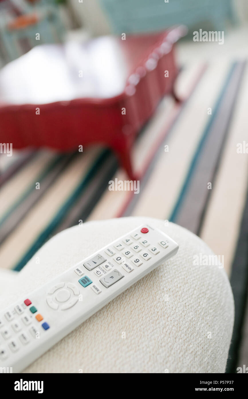 remote control. Program switching or button pressing on TV keypad ...