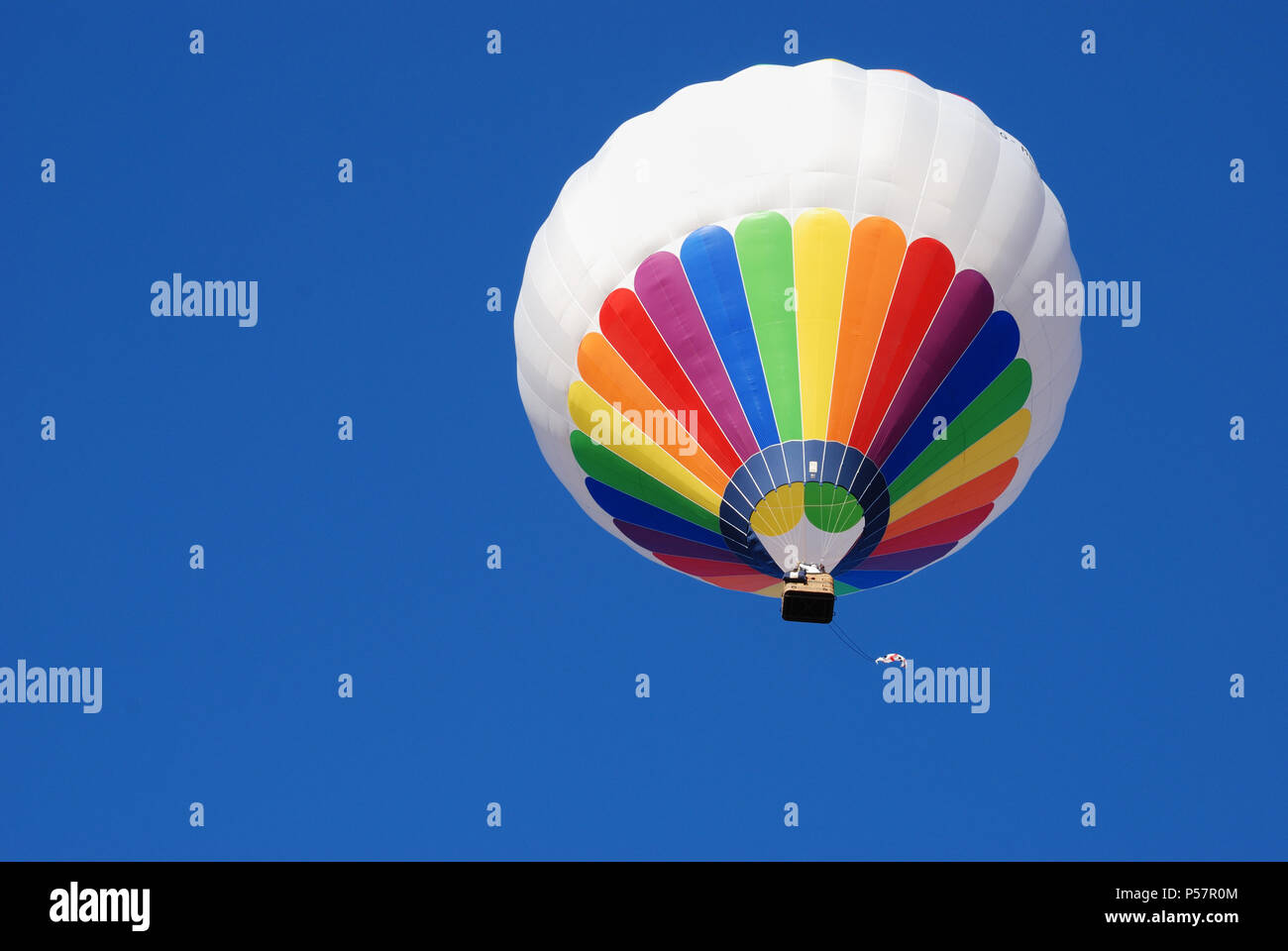 Rainbow colored hot air balloon hi-res stock photography and images - Alamy