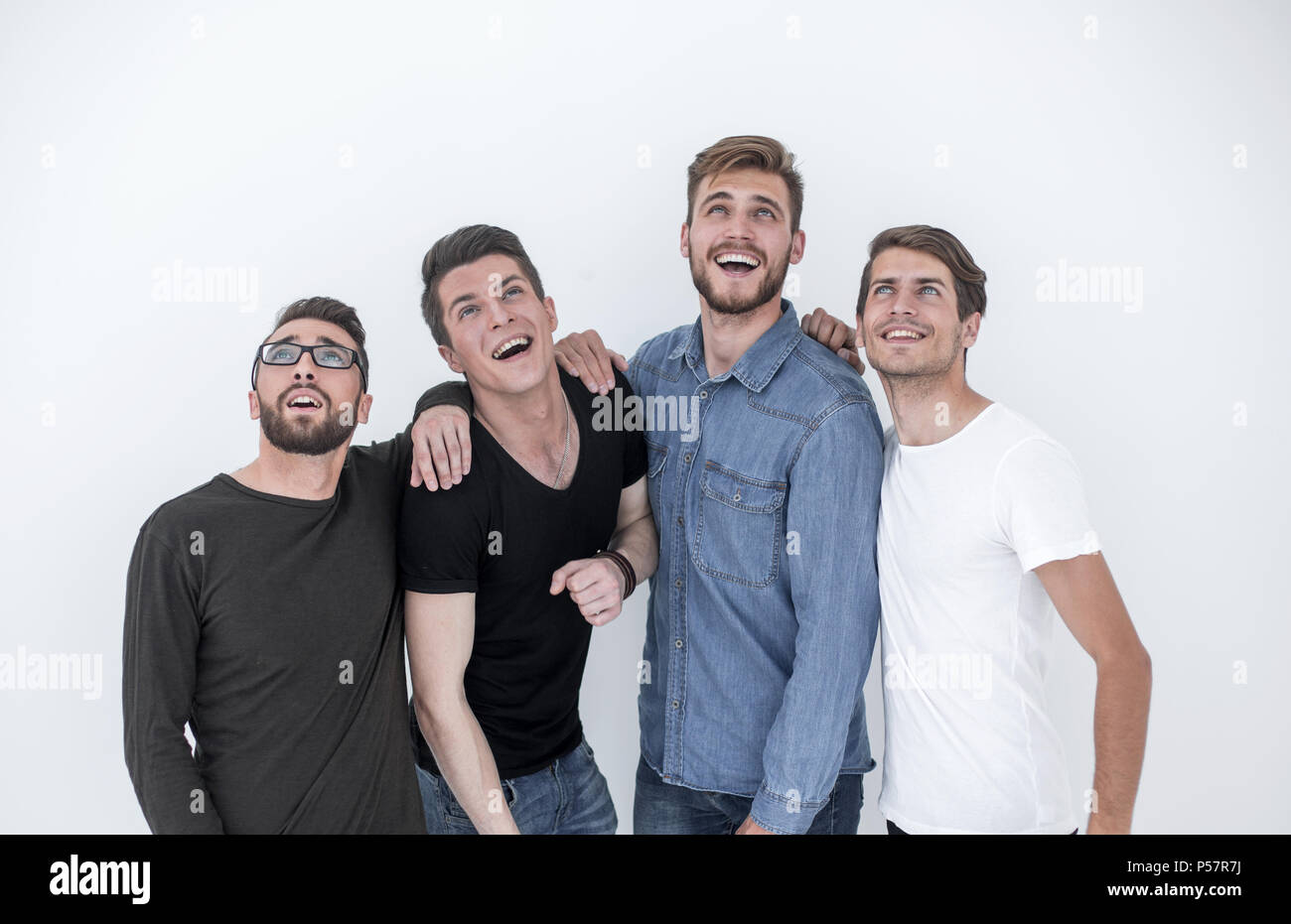 group of happy young men looking up Stock Photo - Alamy