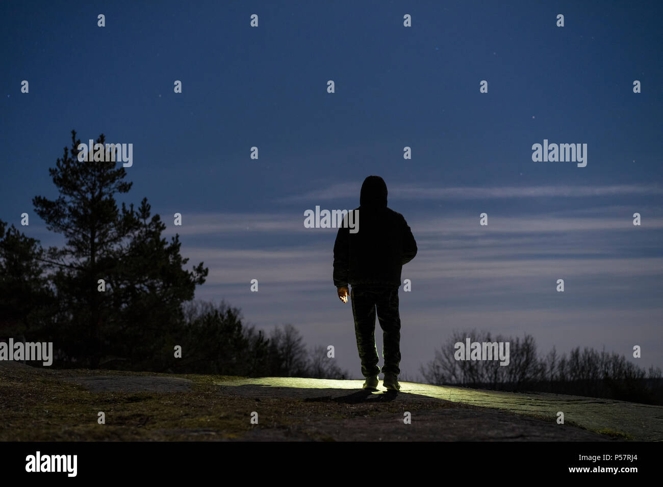 Man searching torch light hi-res stock photography and images - Alamy