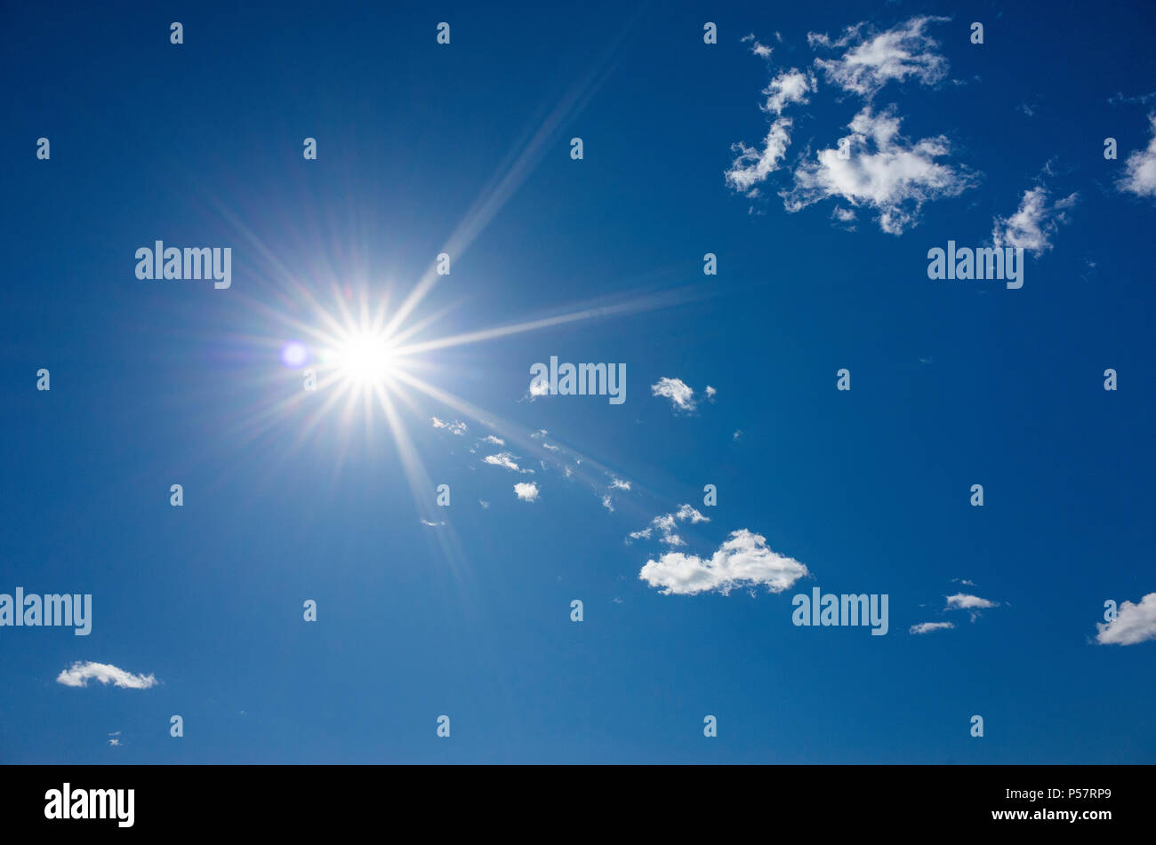 Beautiful blue sky and shining sun, White nice clouds on sunny spring ...