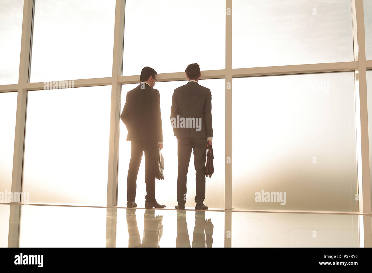 business background.business partners look through the office window ...