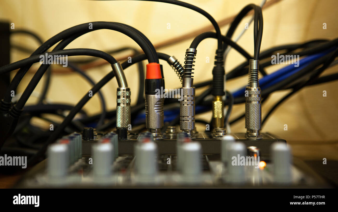 audio mixing console with wires Stock Photo - Alamy