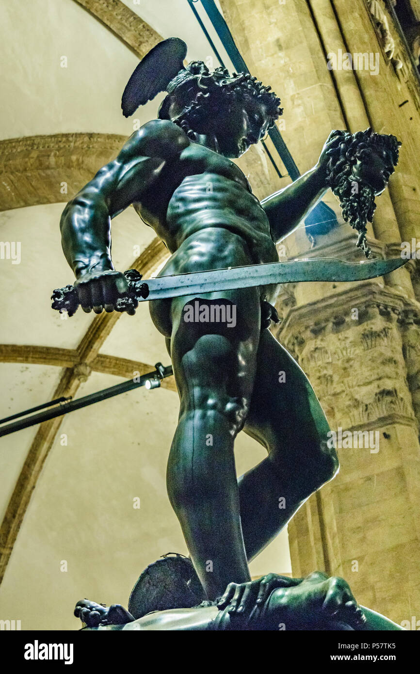 Low angle side view of famous Perseo with Medusa head cellini sculpture ...