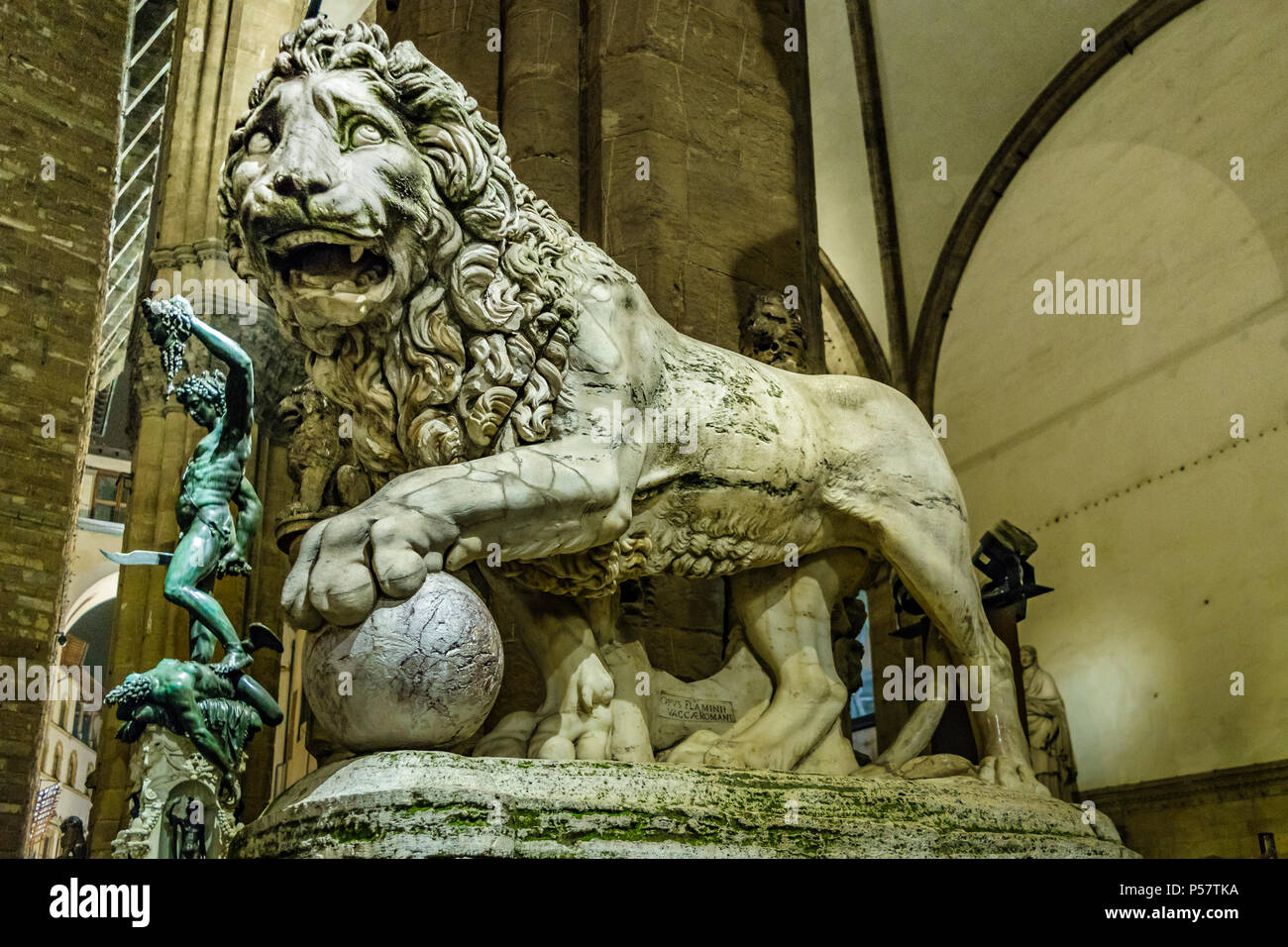 Low angle side view of famous medici lion at loggia della signoria in ...