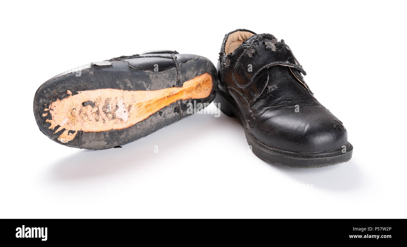 a new leather shoe and a damaged old one on white Stock Photo - Alamy