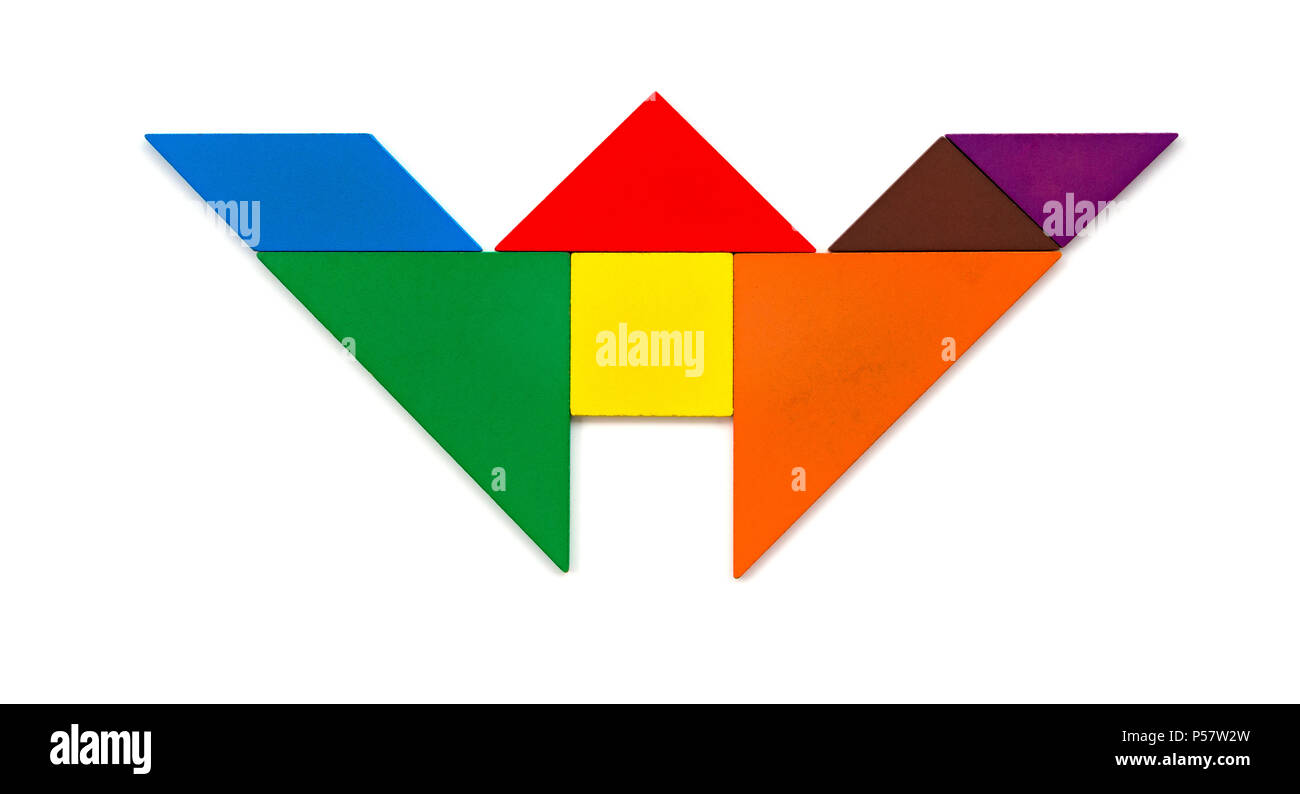 tangram shaped like a letter W on white background Stock Photo - Alamy