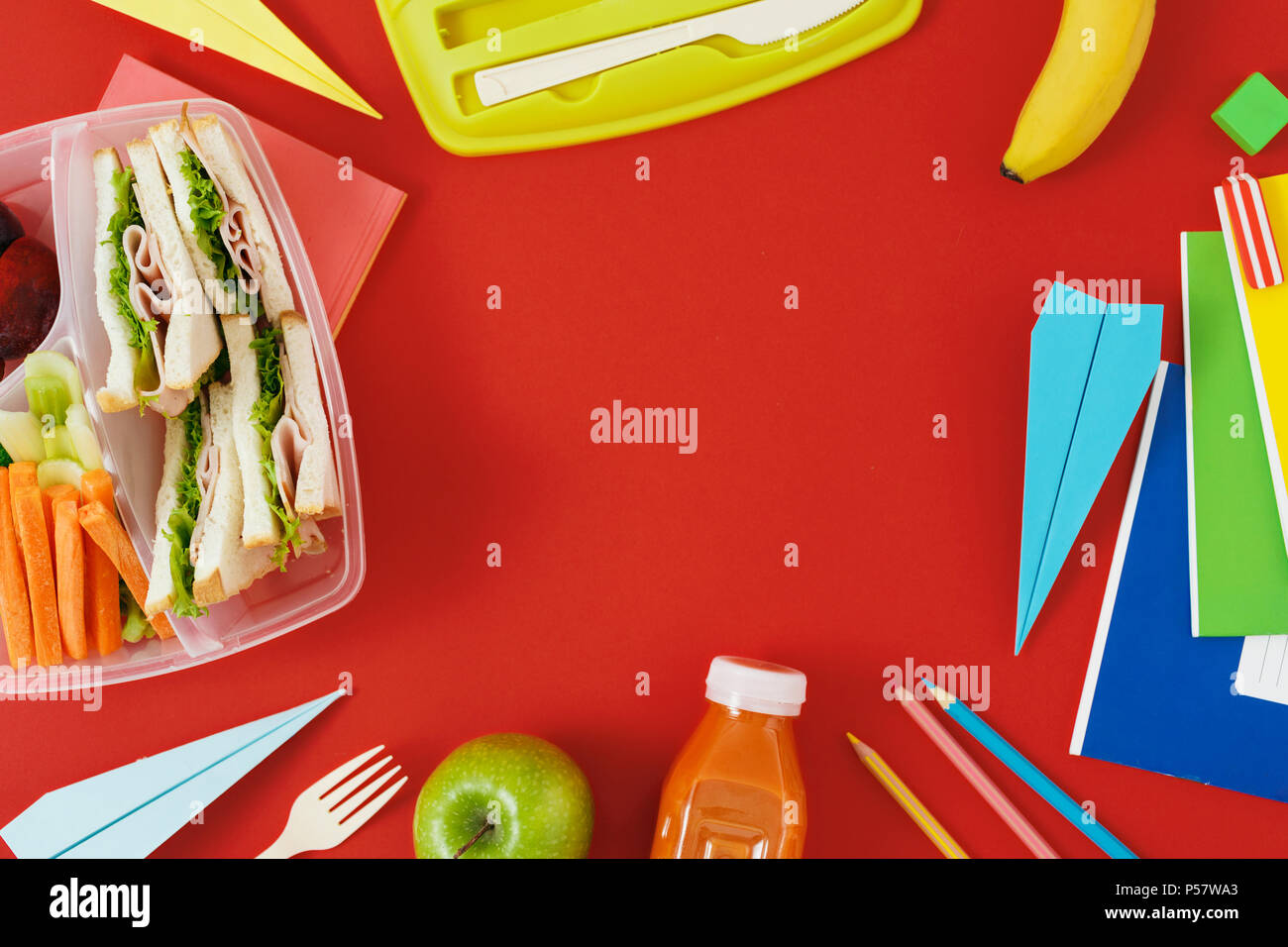 Frame from healthy school lunch box with sandwich, vegetables, juice ...
