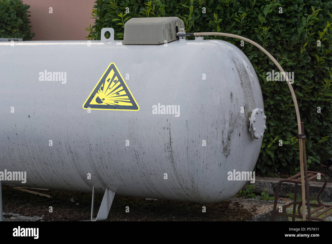 Large propane gas tank or liquid gas tank in a garden Stock Photo - Alamy