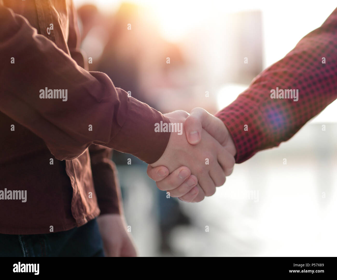 closeup of handshake between two men i Stock Photo - Alamy