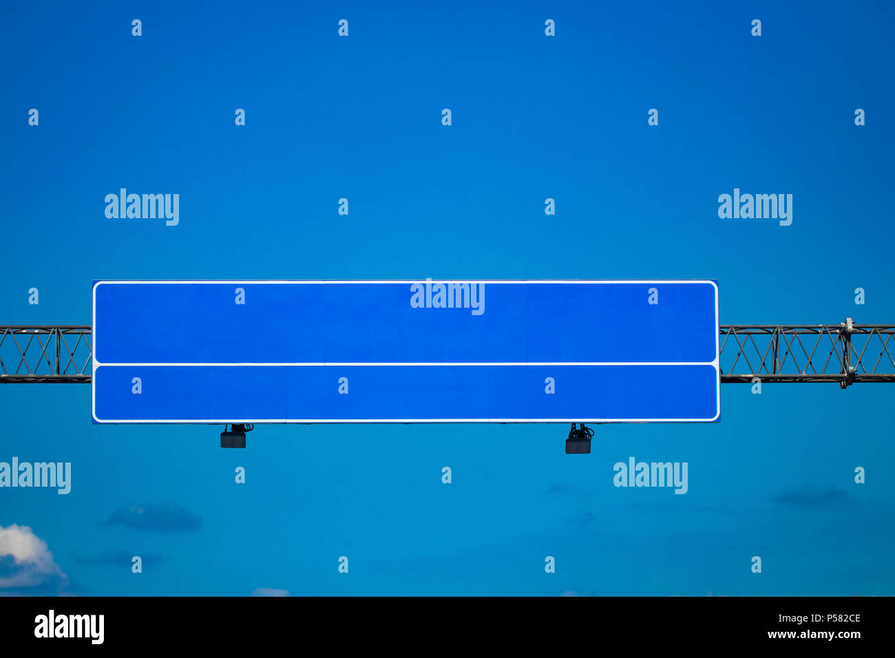 Big blank highway road sign with gradient blue sky Stock Photo - Alamy