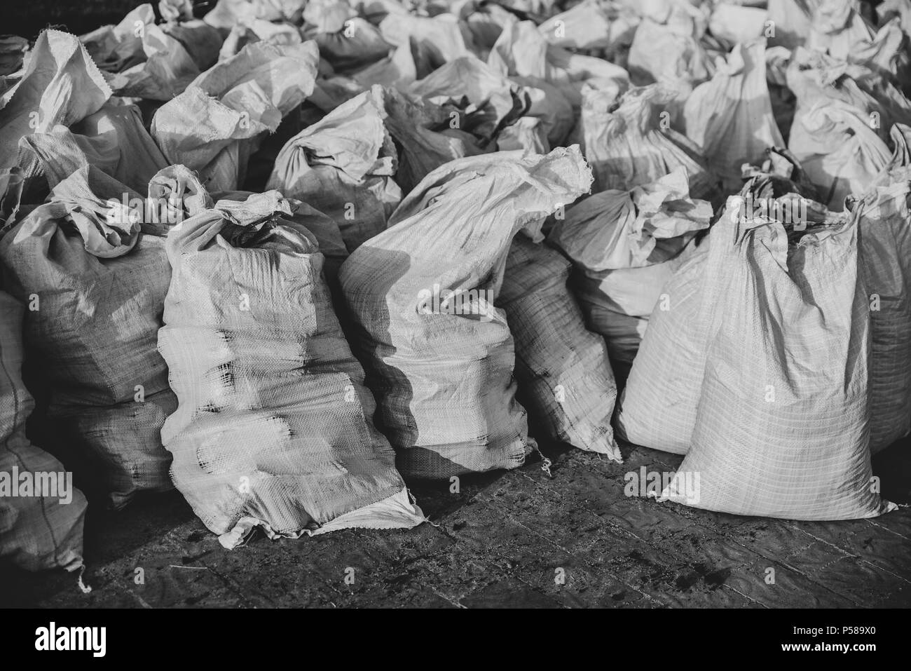 Plastic woven sack Black and White Stock Photos & Images - Alamy